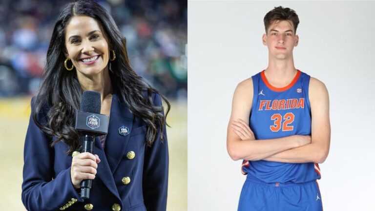 Reporter goes viral after taking photo with 7'9" basketball player