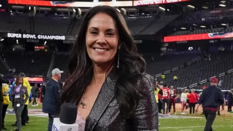 Repórter viraliza após tirar foto com jogador de basquete de 2,36m